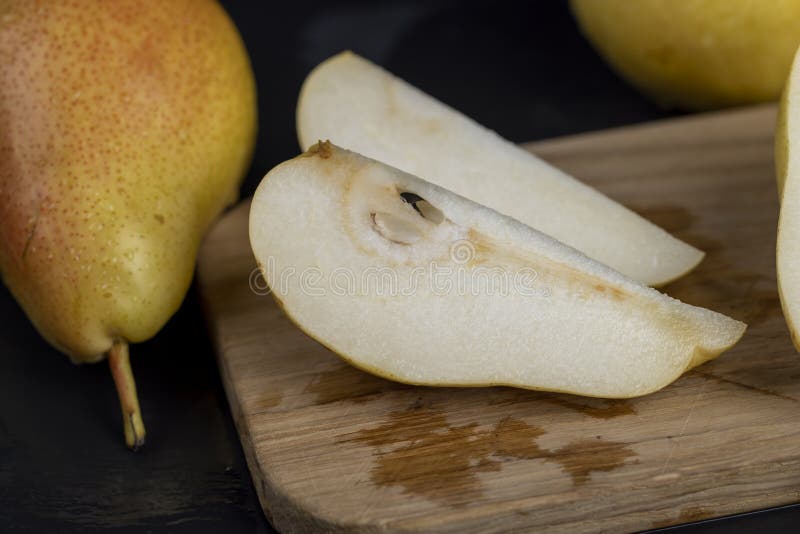 Delicious Yellow Pears with a Red Side Cut into Pieces Stock Image ...