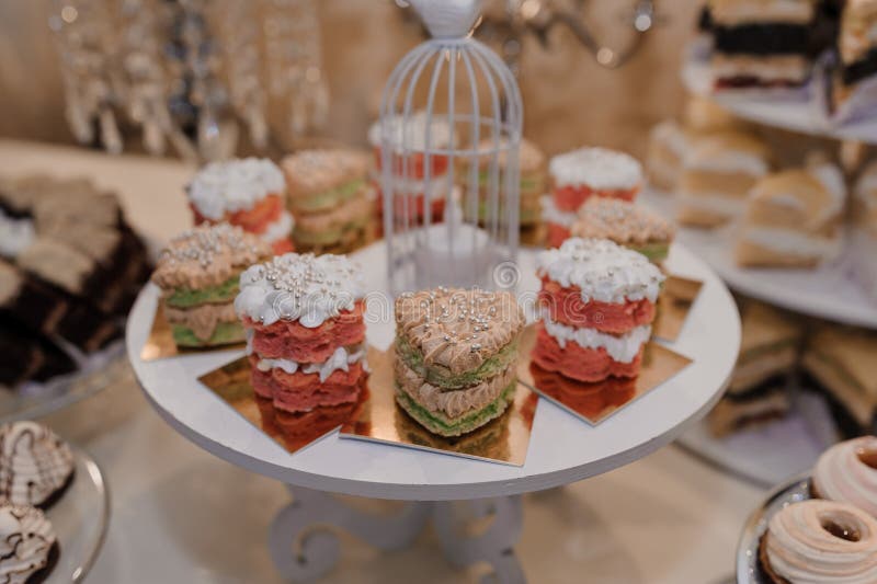 Deliciously Colorful Assortment of Gourmet Cakes Displayed Elegantly ...