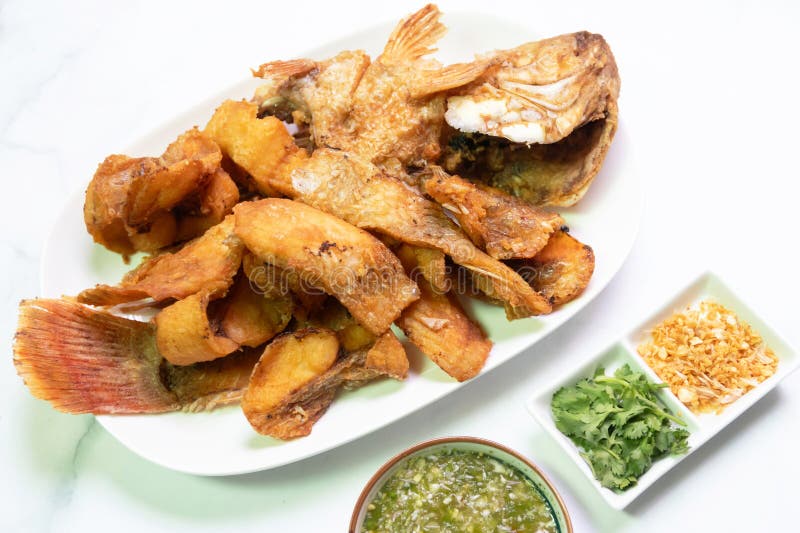 Deliciously Fried Ruby Fish Served with Spicy Sauce Stock Image - Image ...