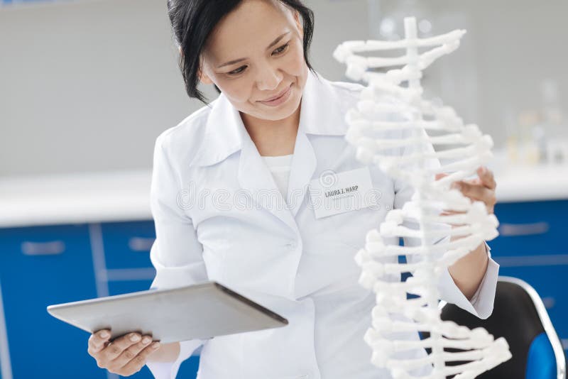 Delighted Biological Engineer Studying Genetic Mutations Stock Photo ...