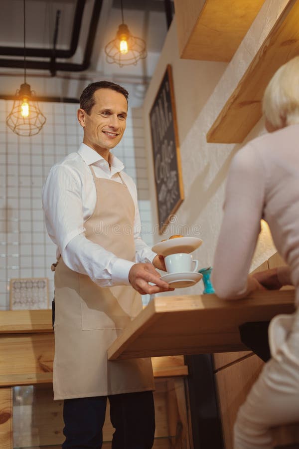 Delighted Cheerful Waiter Serving Brunch Stock Photo - Image of ...