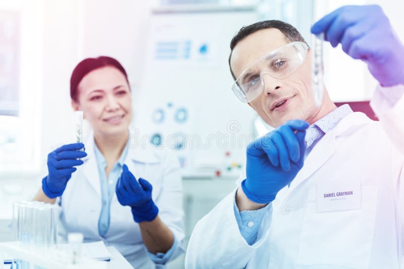 Delighted Nice Man Working in the Laboratory Stock Photo - Image of ...