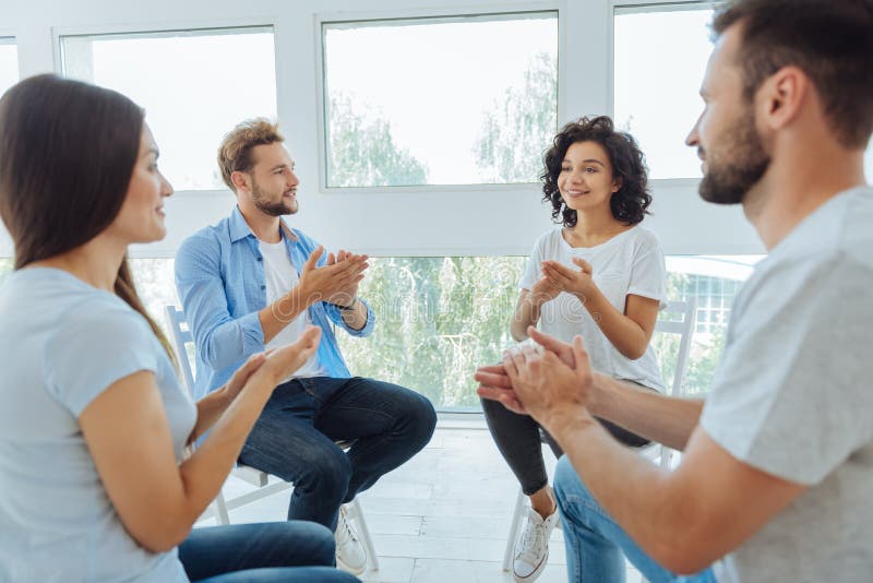 Delighted Positive Group Members Supporting Each Other Stock Image ...