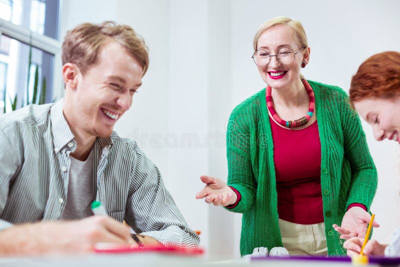 Delighted Positive Woman Seeing the Progress of Her Students Stock ...