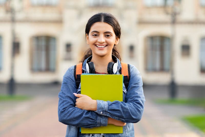 Delighted Young Indian Woman Student with Her Study Materials Stock ...