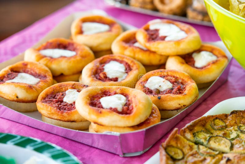 Delightful Appetizers with Small Pizzas on the Table Stock Photo ...