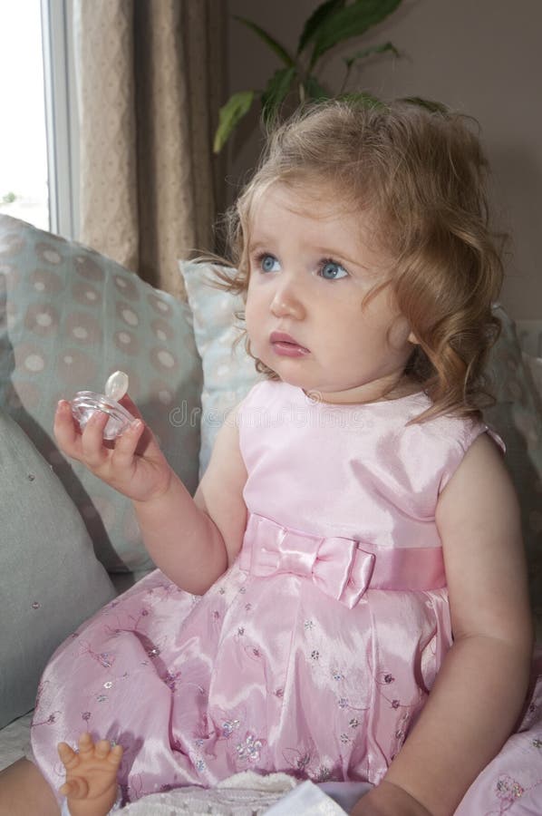 Delightful Baby Girl with Dummy. Stock Image - Image of clear, baby ...