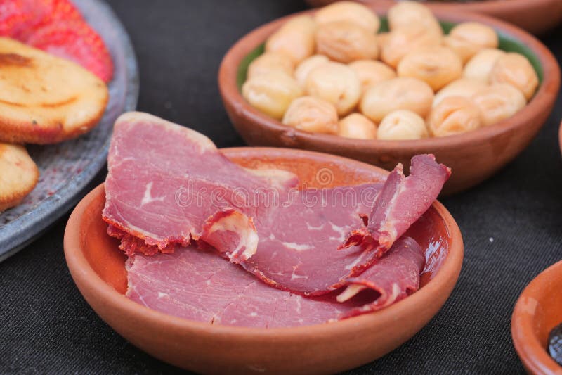 A Delightful Cured Meat Platter Beautifully Arranged with Various ...