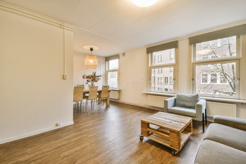 Delightful Living Room with Plush Sofas Stock Photo - Image of ...