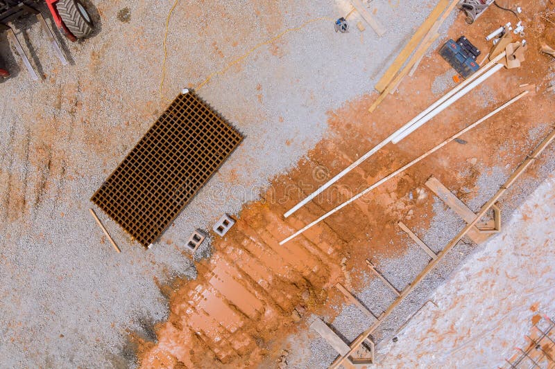 Delivering Reinforced Concrete Steel Rods Bars To a Foundation Using a ...