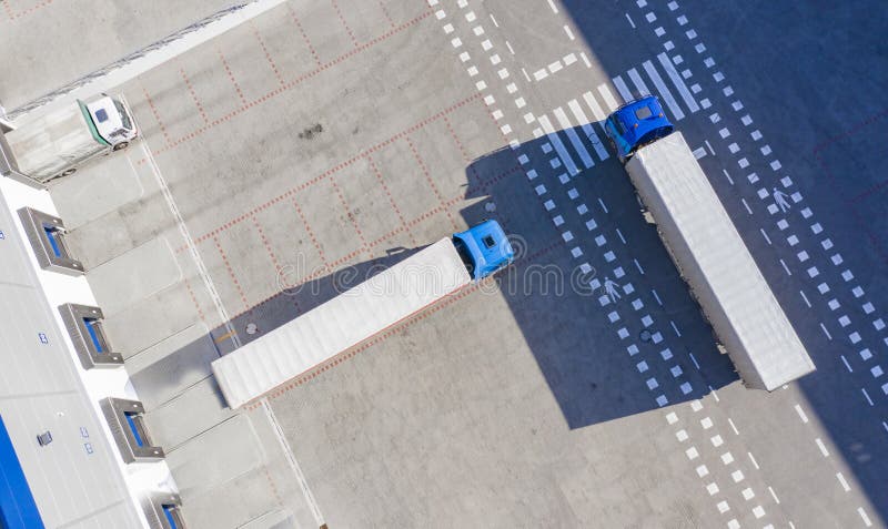 Delivering or Supply Concept Image. Trucks Loading at Facility ...