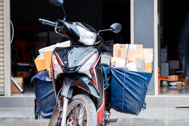 Delivery Box on Motorcycle Standing in Front of Delivery Service Office ...