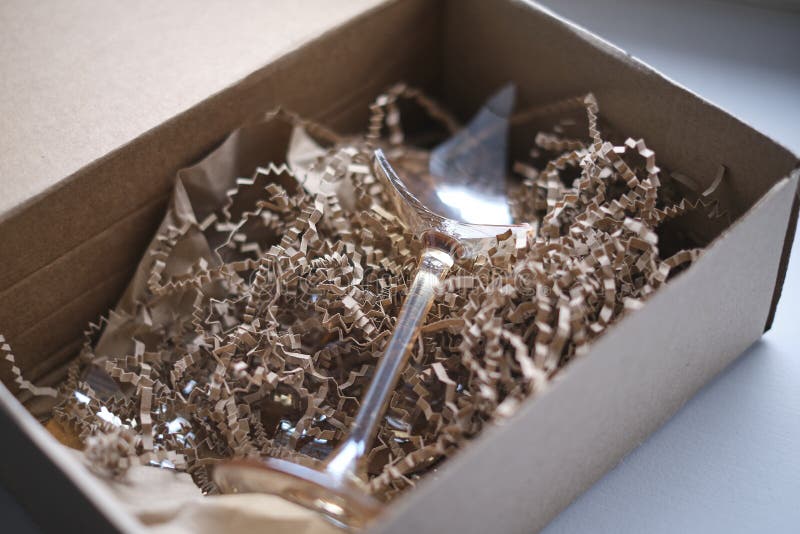 Delivery Box from a Store and Discovers a Broken Glass. an Improperly ...
