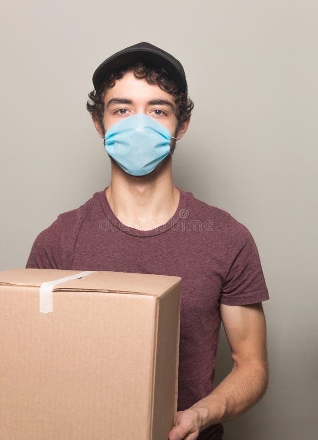 Delivery boy mask vertical stock photo. Image of postman - 179210914