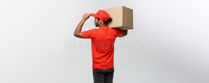 Delivery Concept - Back View of Handsome African American Delivery Man ...