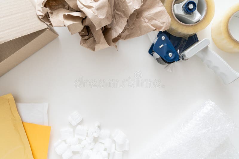 Delivery Concept - Packaging Materials on Wood Background Stock Photo ...