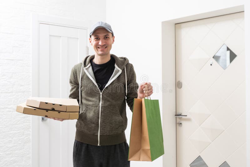 Delivery Concept. Portrait of Handsome Pizza Delivery Man Stock Photo ...