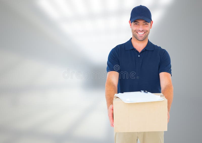 Delivery Courier with Box in Front of Blurred Background Stock Photo ...