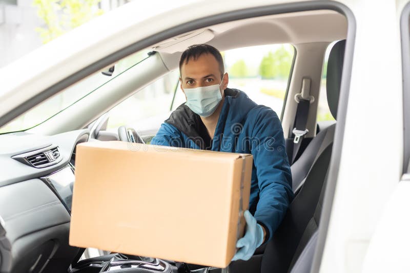 Delivery Driver Driving with Parcels on Seat Stock Photo - Image of ...