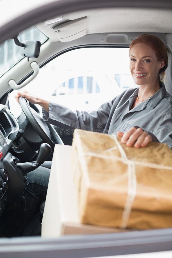 Delivery Driver Driving Van with Parcels on Seat Stock Photo - Image of ...
