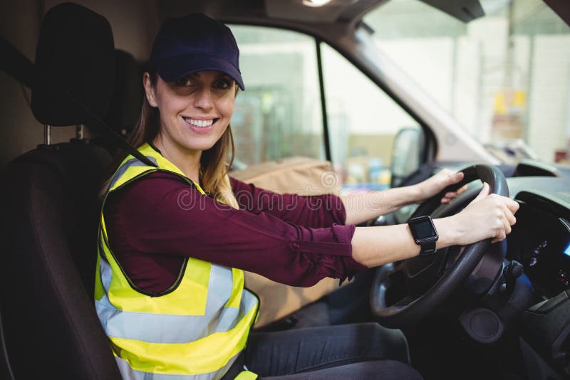 Delivery Driver Driving Van with Parcels on Seat Stock Photo - Image of ...