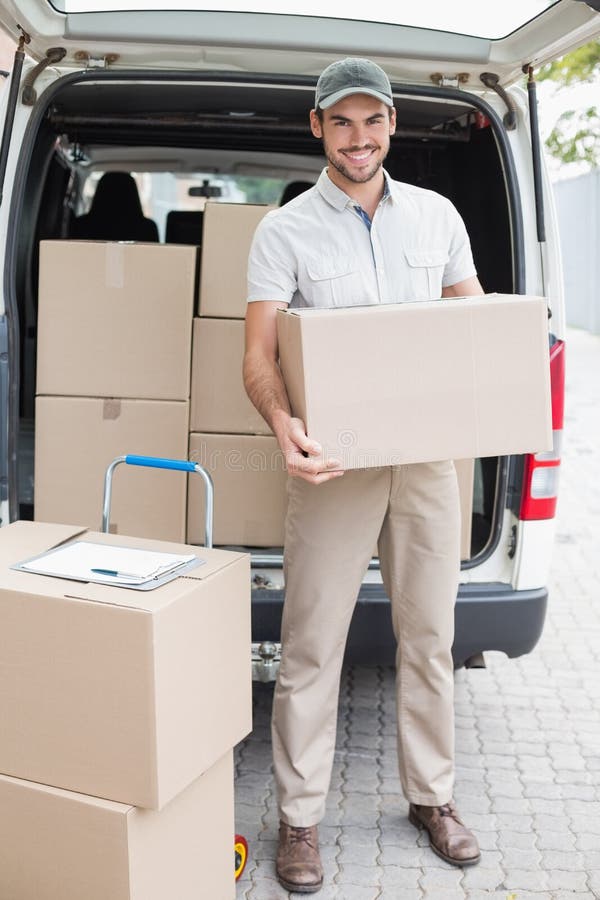 Delivery Driver Loading His Van with Boxes Stock Image - Image of ...