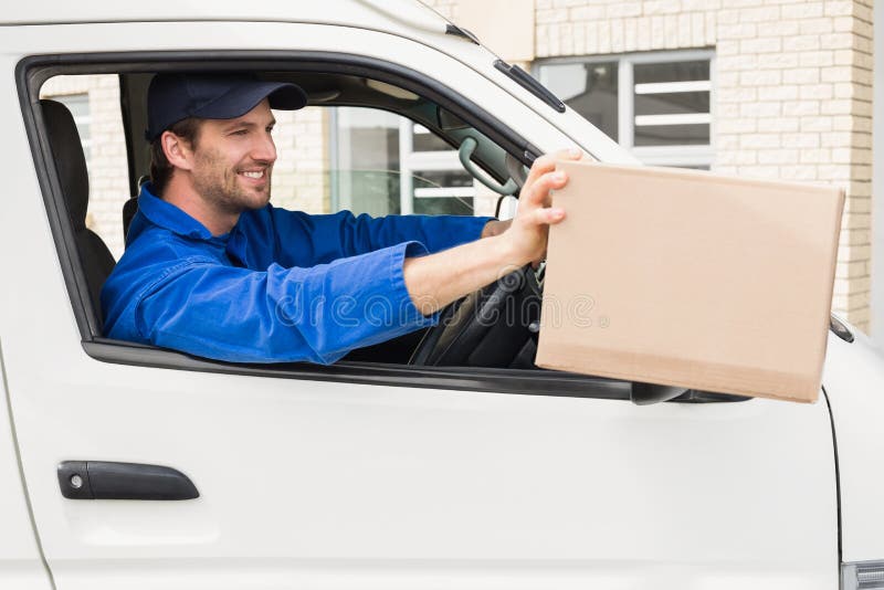 Delivery Driver Offering Parcel from His Van Stock Image - Image of ...