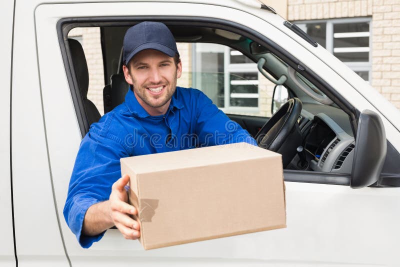 Delivery Driver Offering Parcel from His Van Stock Photo - Image of ...