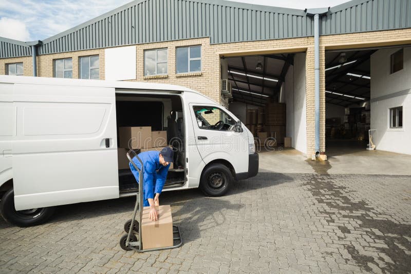 Delivery Driver Packing His Van Stock Image - Image of person, shipping ...