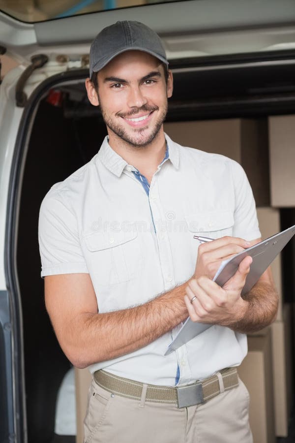 Delivery Driver Smiling at Camera beside His Van Stock Photo - Image of ...