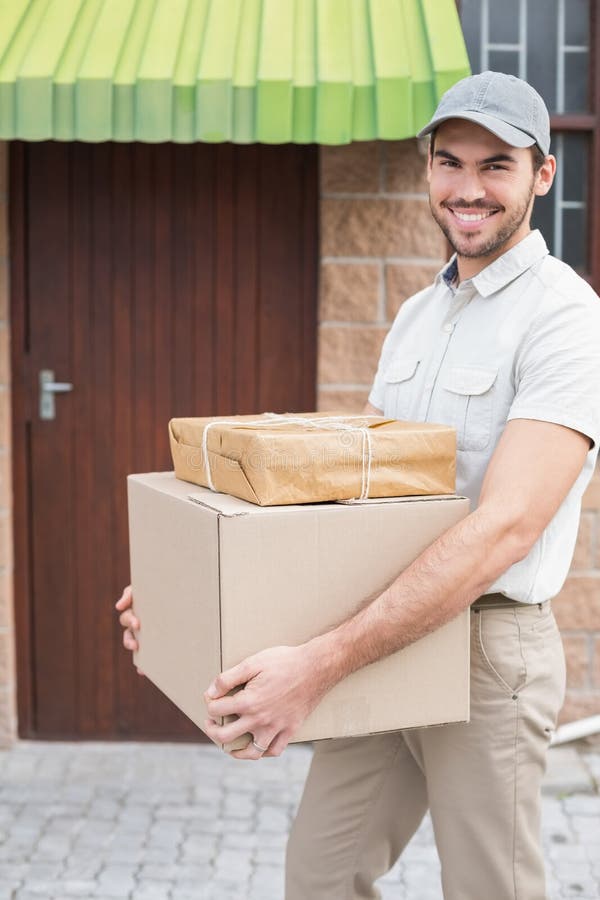Delivery Driver Walking with Parcels Stock Photo - Image of business ...