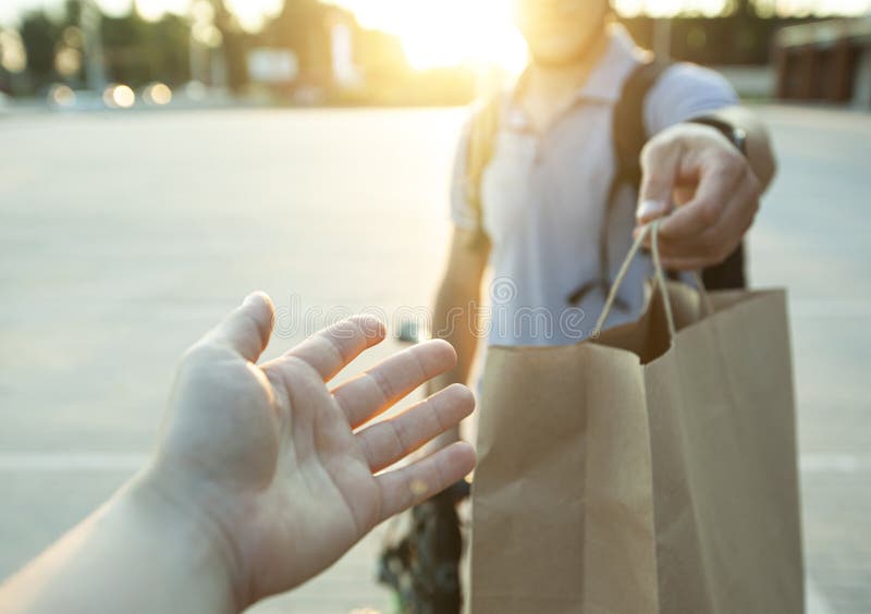 Delivery Guy on the Bicycle is Giving the Order Stock Image - Image of ...