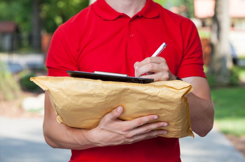 Delivery Guy Does His Paperwork Stock Photo - Image of form, cargo ...