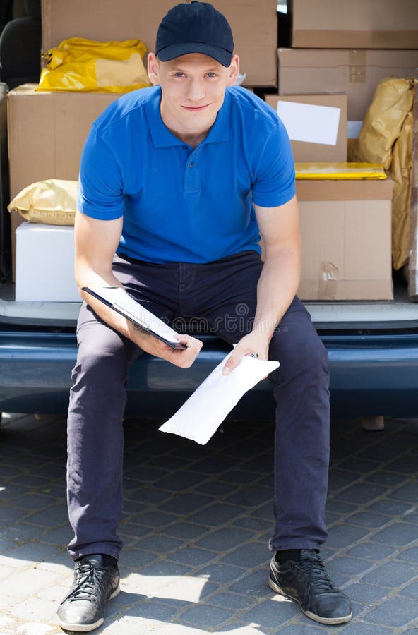 Delivery Guy Sitting on His Van Stock Image - Image of courier ...