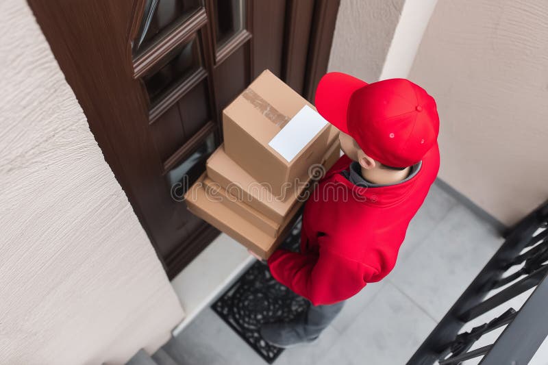 Delivery Guy Stacks Multiple Parcels on Doorstep Viewed from Above ...