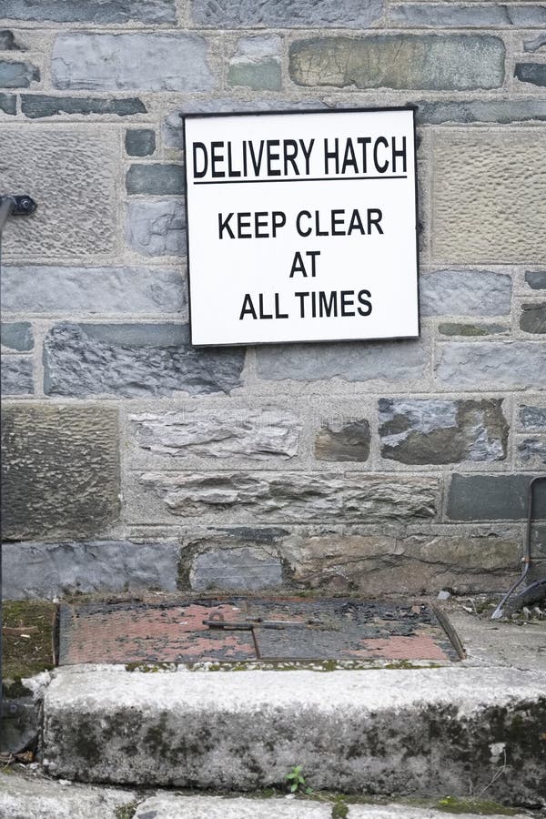 Delivery Hatch for Pub and Bar Keep Clear Sign Stock Photo - Image of ...
