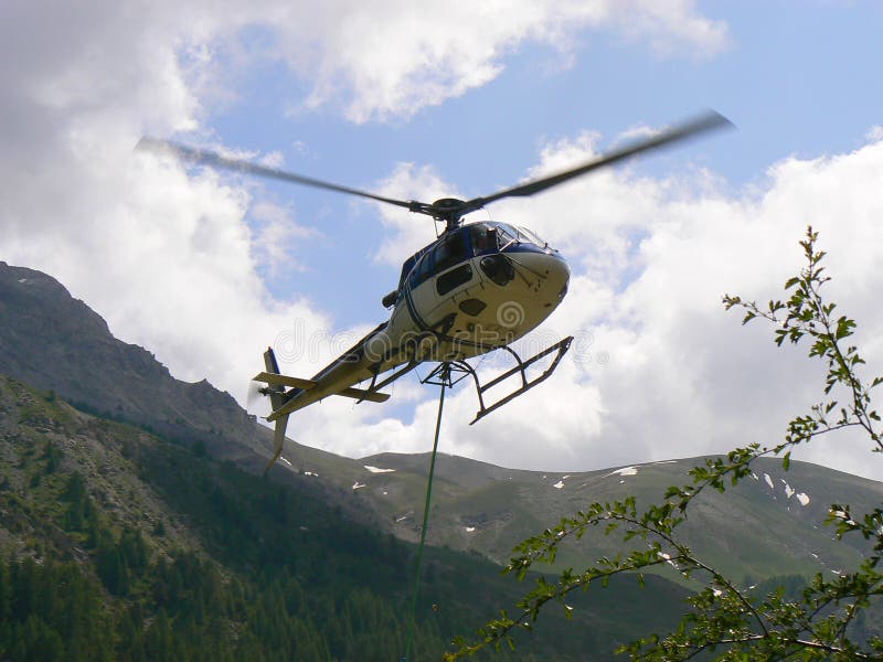 Delivery by helicopter stock photo. Image of helicopter - 57711630