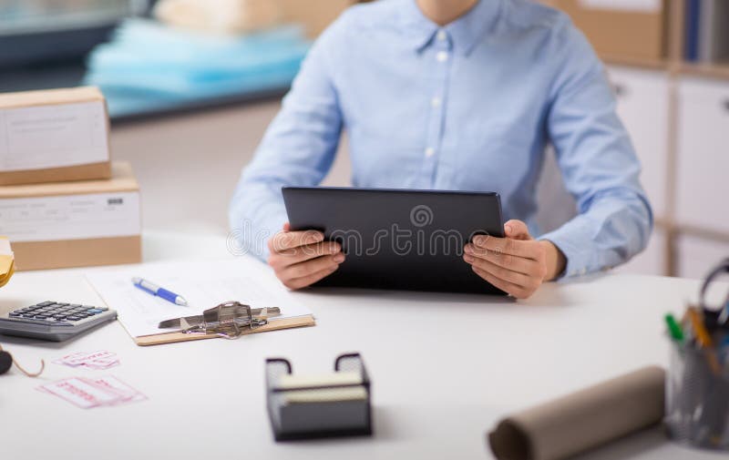 Woman with Tablet Pc and Clipboard at Post Office Stock Image - Image ...