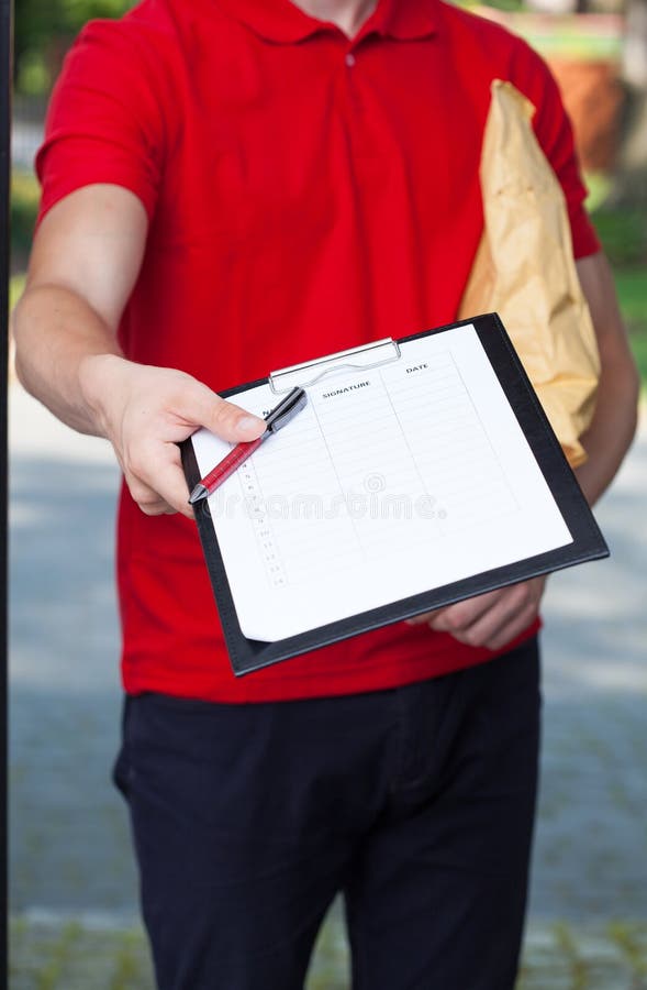 Delivery Man Asking for Signature Stock Image - Image of people, carton ...
