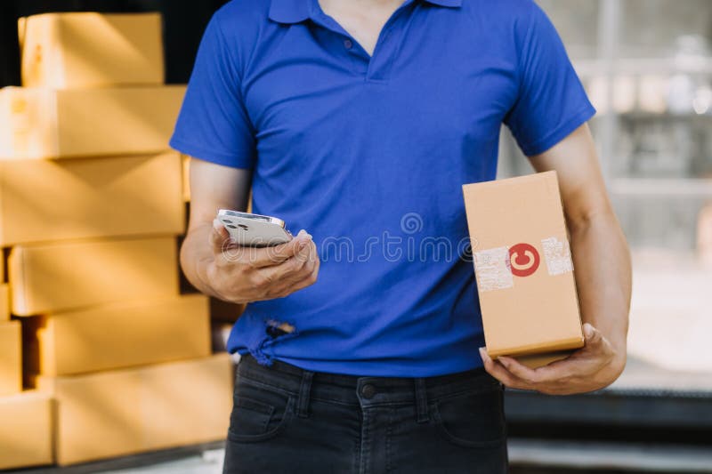 Delivery Man with Cardboard Box Checking Document List in Van and ...