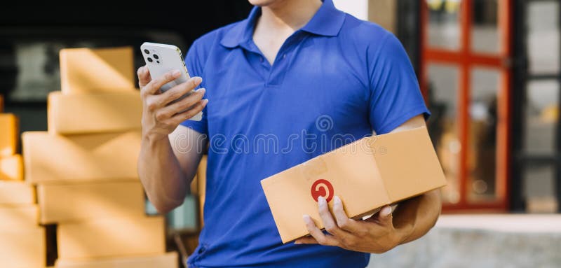 Delivery Man with Cardboard Box Checking Document List in Van and ...