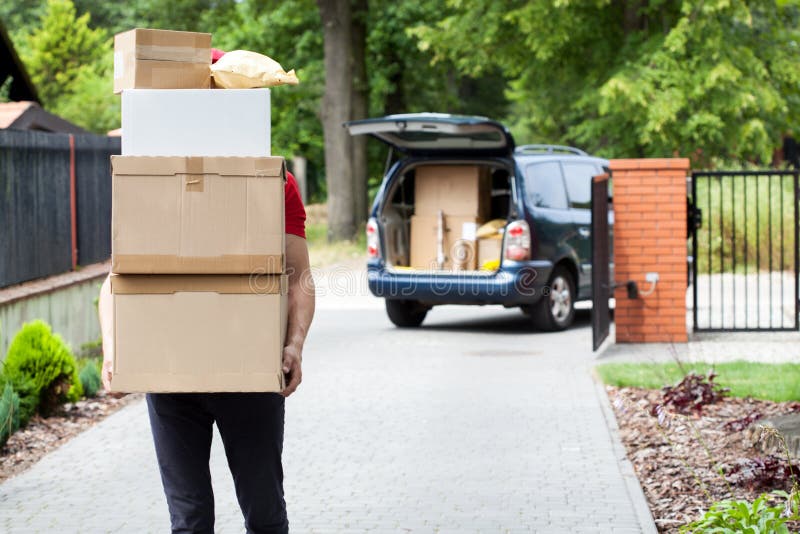 Delivery Man Carrying Package Stack Stock Image - Image of mailman ...