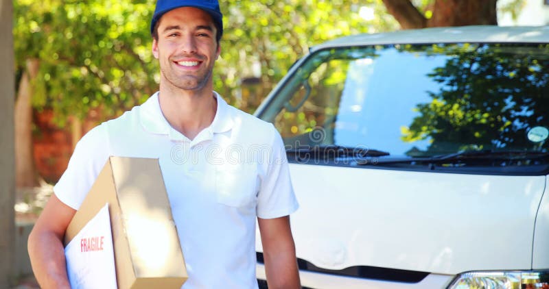Delivery Man Carrying a Parcel Stock Footage - Video of courier ...
