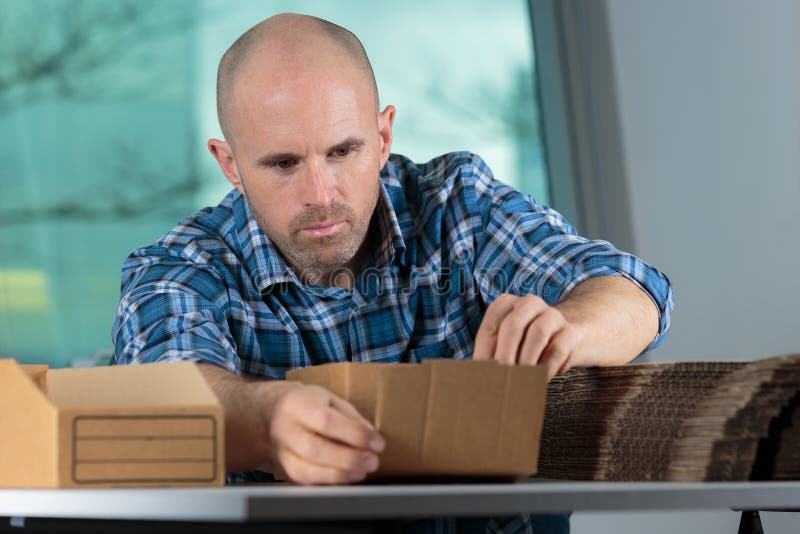 Delivery Man Counting Boxes Stock Photo - Image of isolated, fingers ...