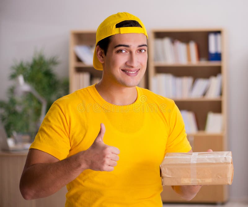 Delivery Man Delivering Parcel Box Stock Photo - Image of house ...