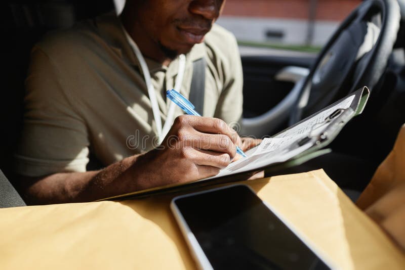 Delivery Man Filling Documents Stock Image - Image of outdoors, adult ...