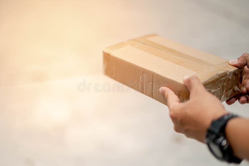 Delivery Man Hand Carrying Cardboard Box Packaging for Logistic ...