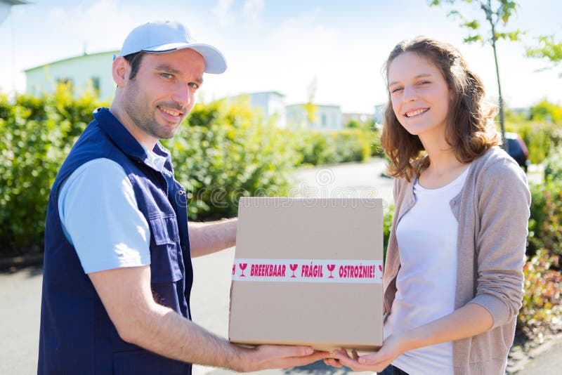 155 Delivery Handing Over Package Stock Photos - Free & Royalty-Free ...