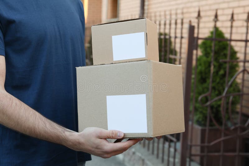 Delivery Man Hold Blank Boxes Outdoor Stock Photo - Image of cardboard ...
