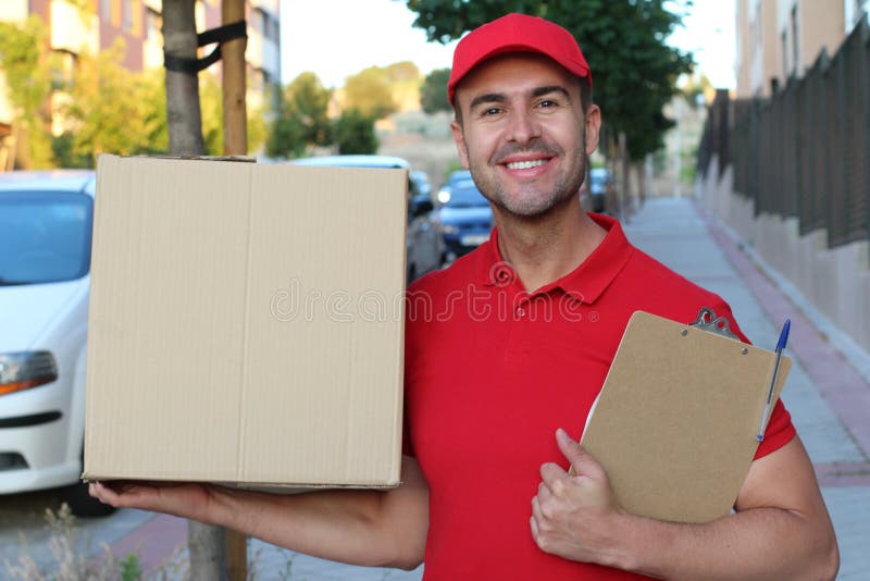 Delivery Man Holding a Box Outdoors Stock Photo - Image of good, latino ...